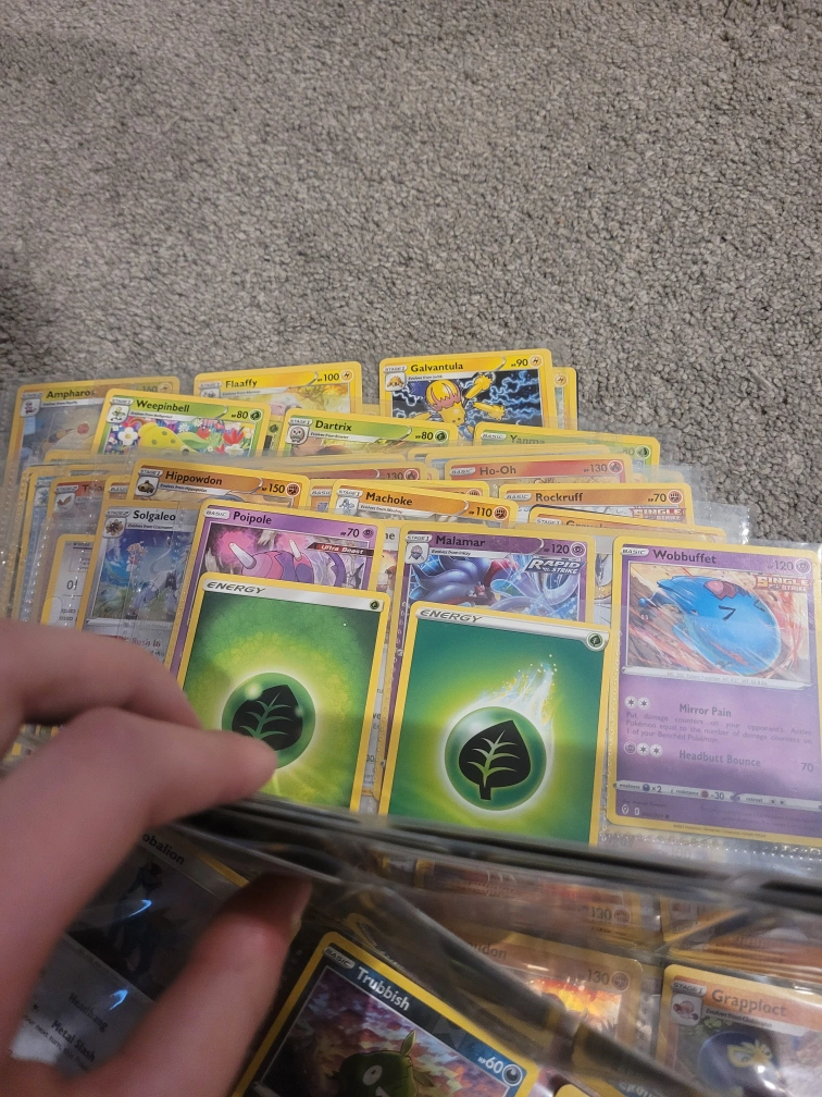 14 pages if holds normal and reverse holds Pokemon cards | Karrot